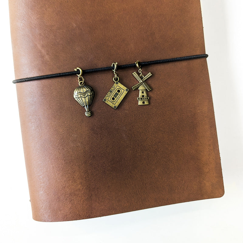 Charms – The Black Canvas